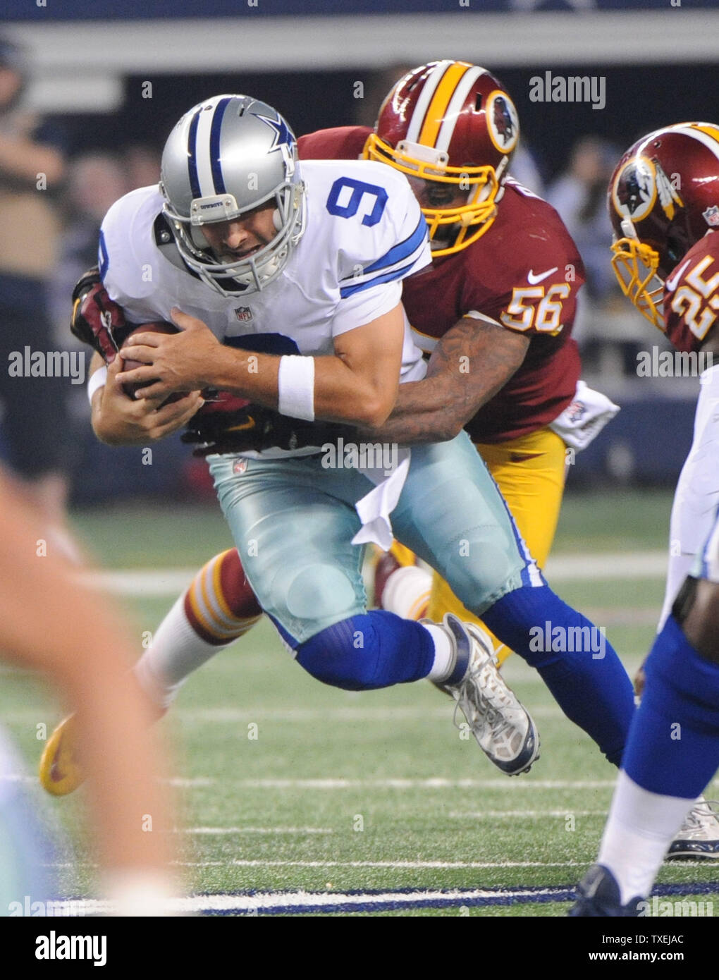 Dallas Cowboys Tony Romo gets sacked by the Washington Redskins Perry ...