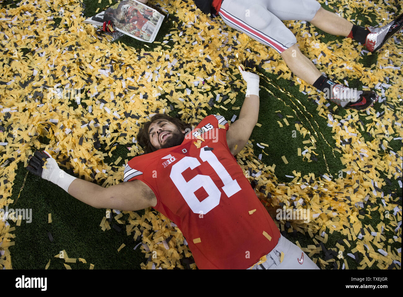 Ohio State Buckeyes offensive lineman Logan Gaskey (61) makes a snow ...