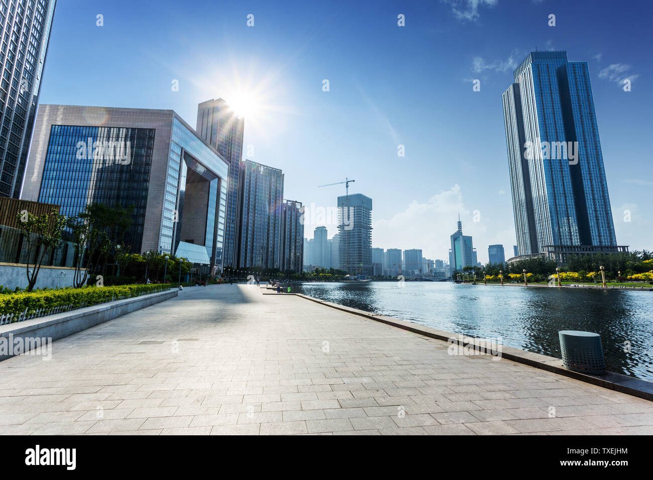 modern building exterior with brick road floor at riverbank Stock Photo ...