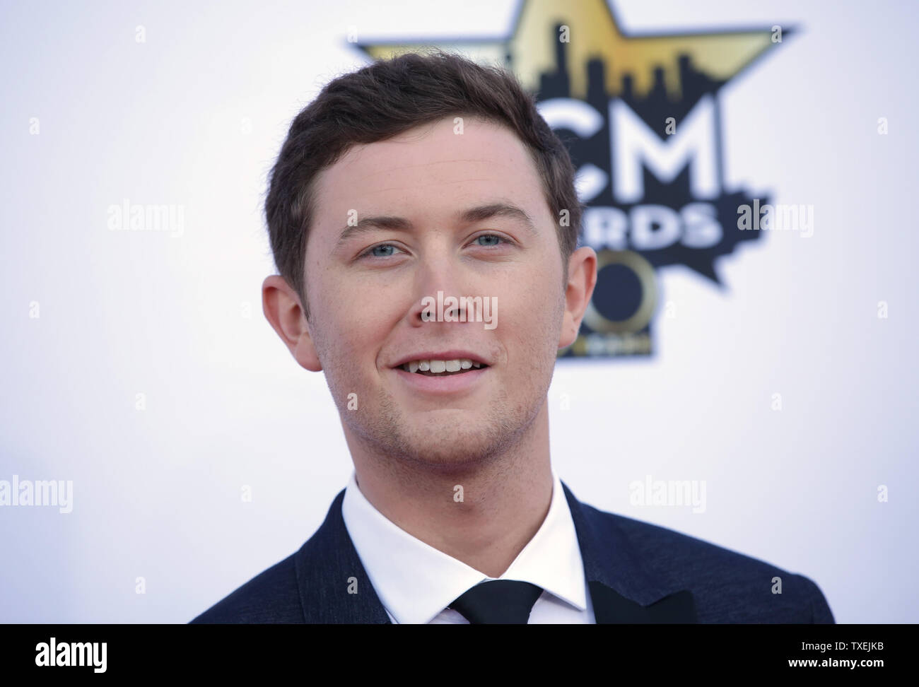 Singer Scotty McCreery arrives at the 50th annual Academy of Country ...