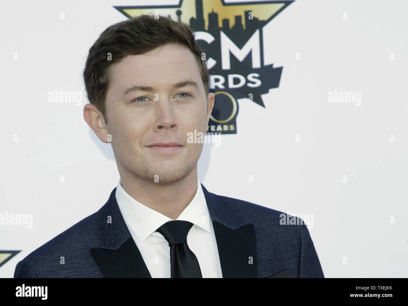 Singer Scotty McCreery arrives at the 50th annual Academy of Country ...