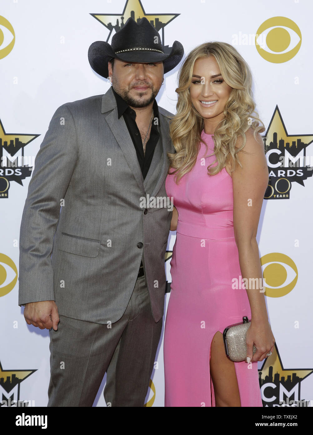 Singer Jason Aldean, left, and Brittany Kerr attend the 50th annual ...