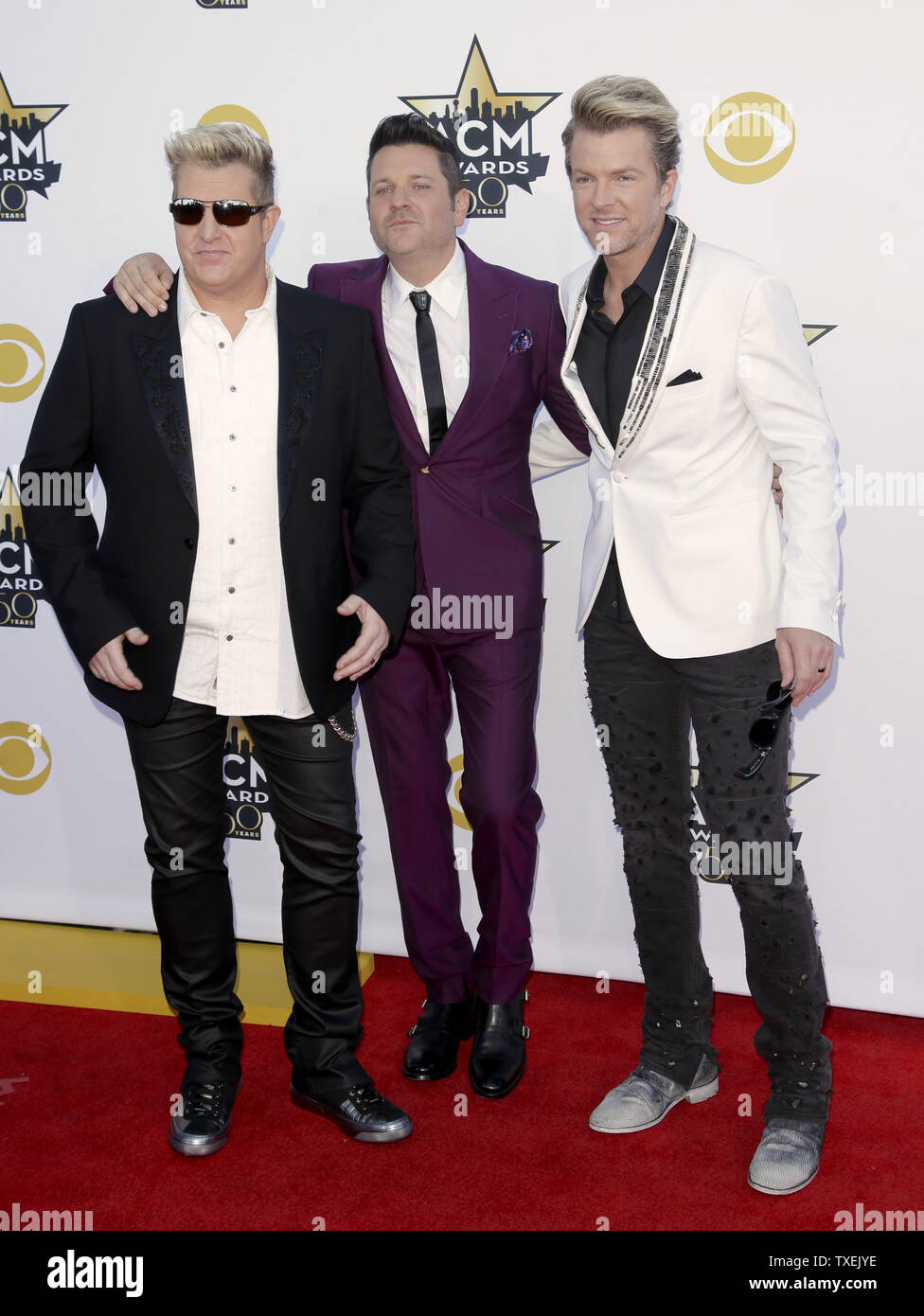(L-R) Gary LeVox, Jay DeMarcus and Joe Don Rooney, of Rascal Flatts ...