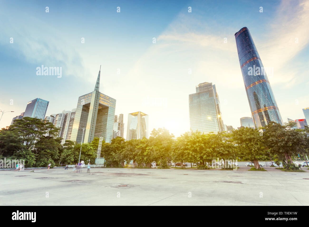Modern square street under sunset Stock Photo - Alamy