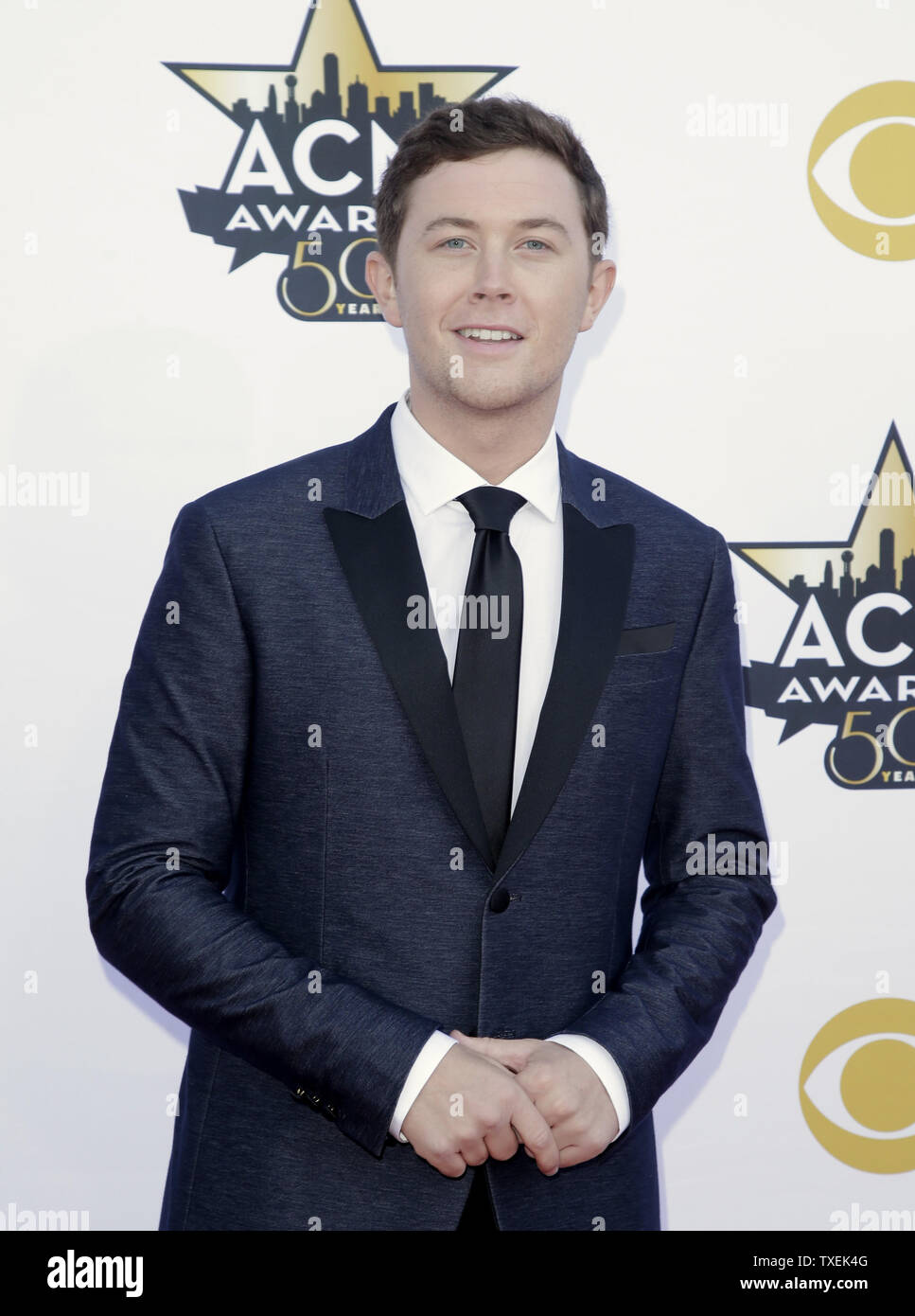 Singer Scotty McCreery arrives at the 50th annual Academy of Country ...