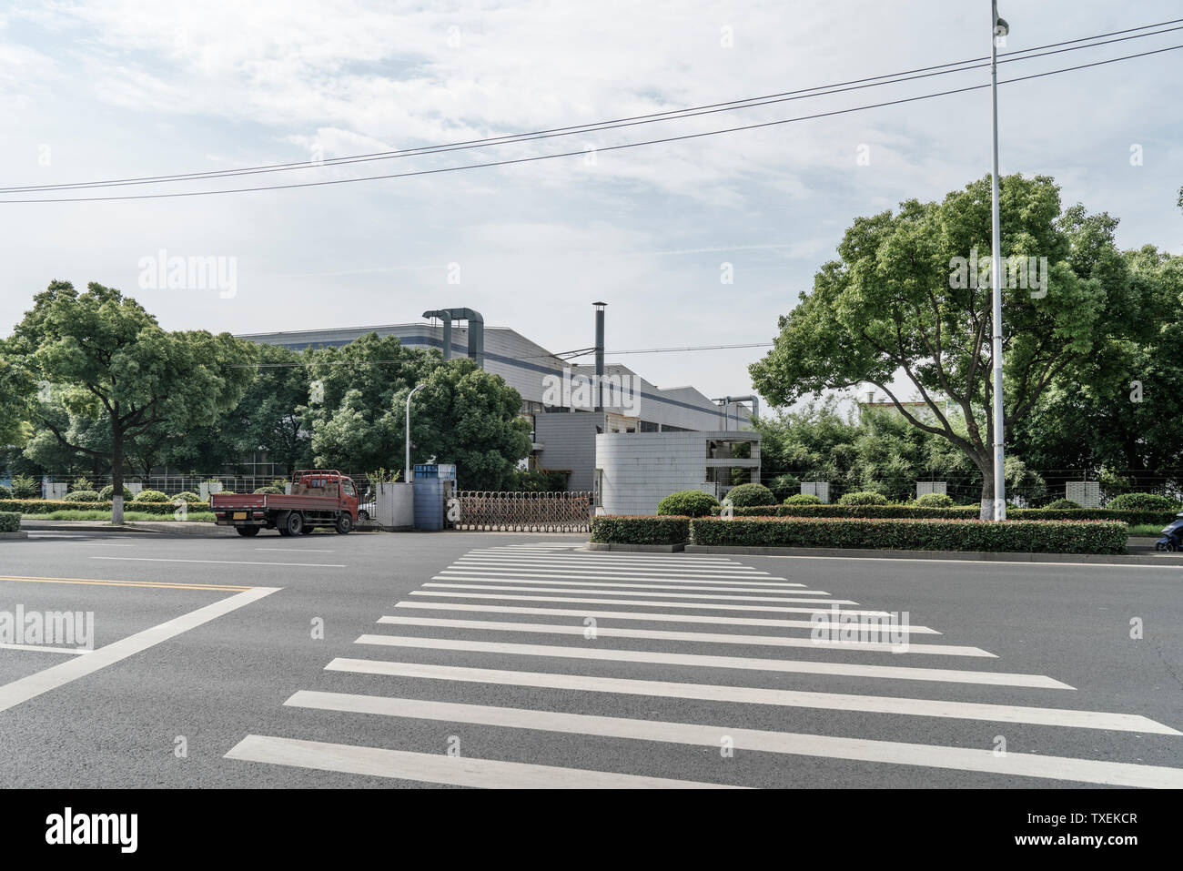 Factory and urban roads Stock Photo - Alamy