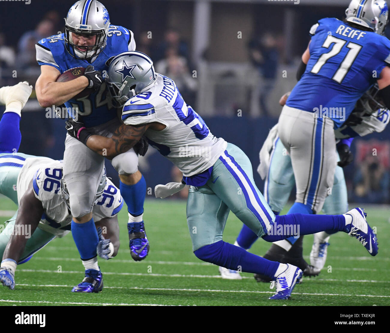 Detroit Lions Zach Zenner gets wrapped up by the Dallas Cowboys Anthony ...