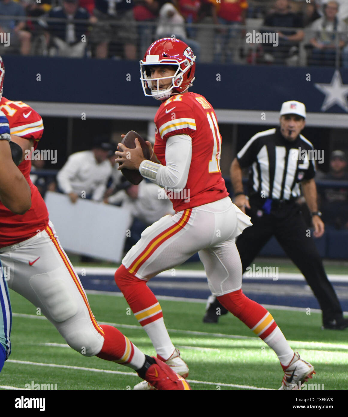 Kansas City Chiefs Alex Smith rolls out against the Dallas Cowboys at ...