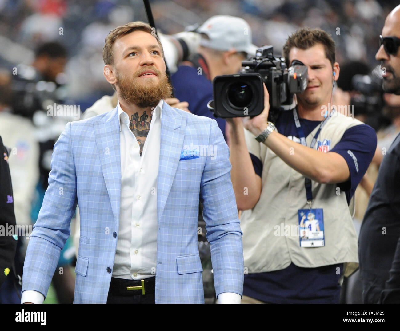 UFC fighter Conor McGregor checks out the sidelines prior to the Dallas ...