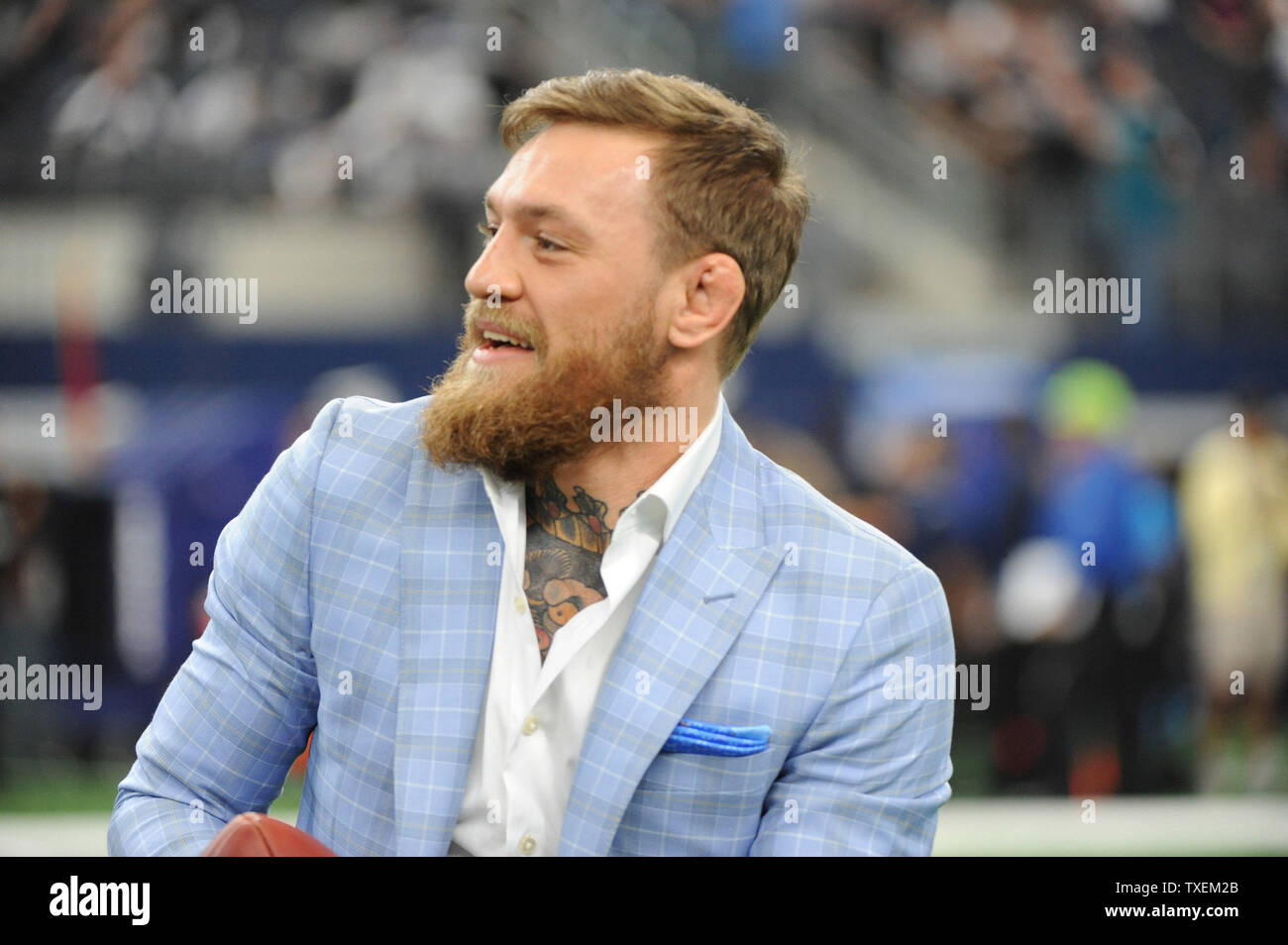 UFC fighter Conor McGregor checks out the sidelines prior to the Dallas ...