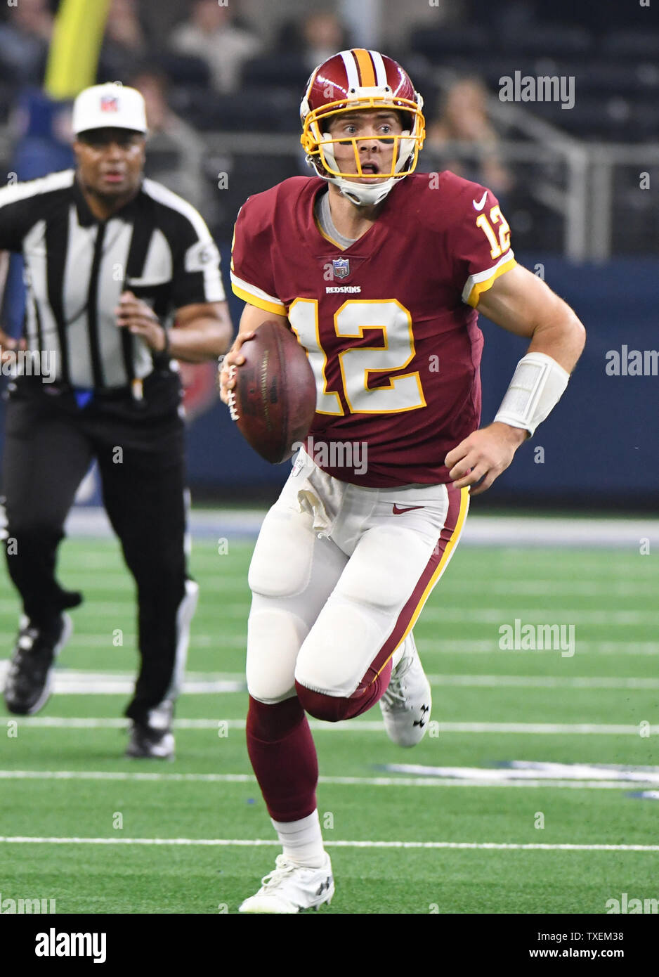 Washington Redskins backup quarterback Colt McCoy scrambles against the ...