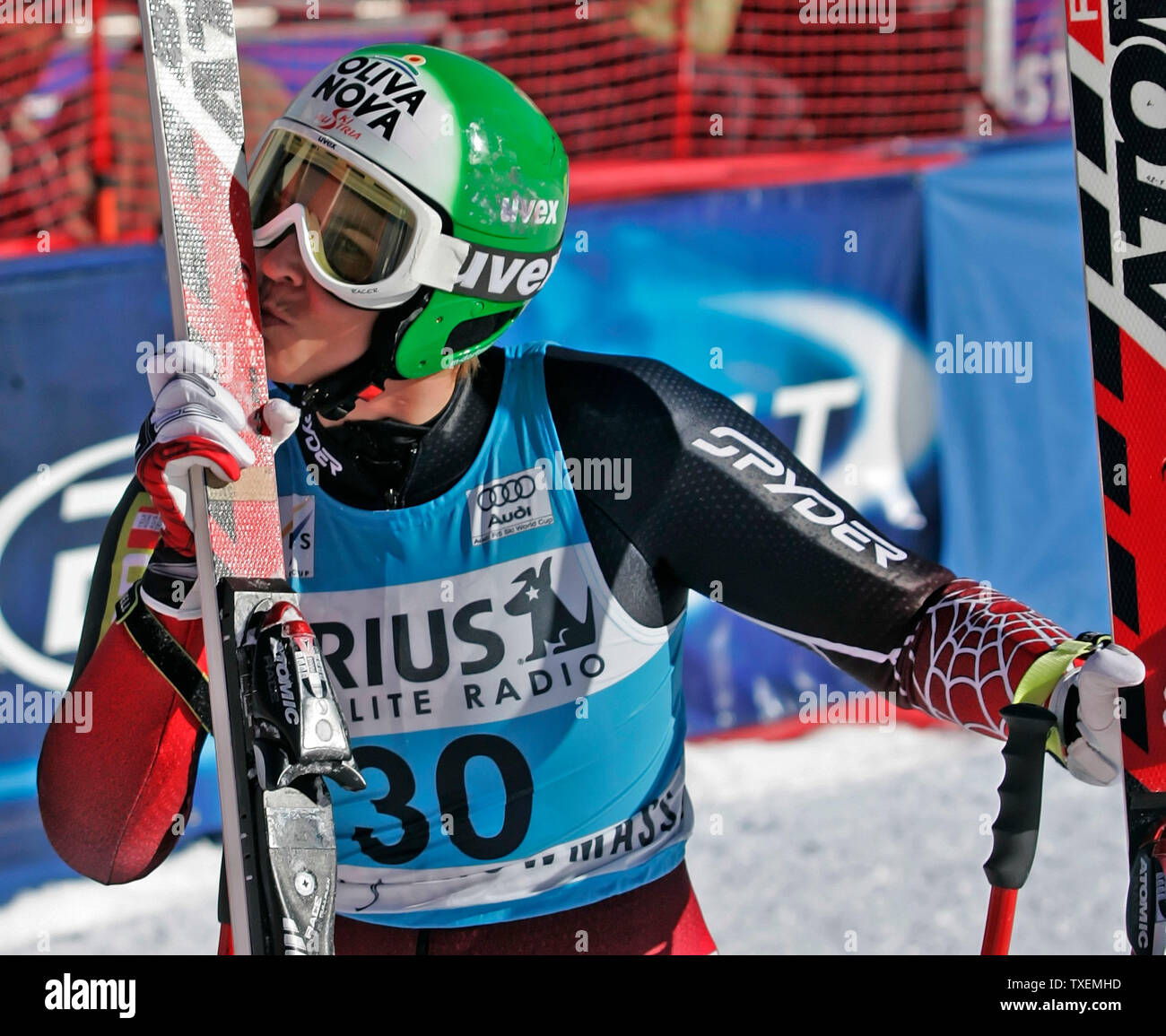 Austria's Michaela Dorfmeister kisses her skis after finishing second ...