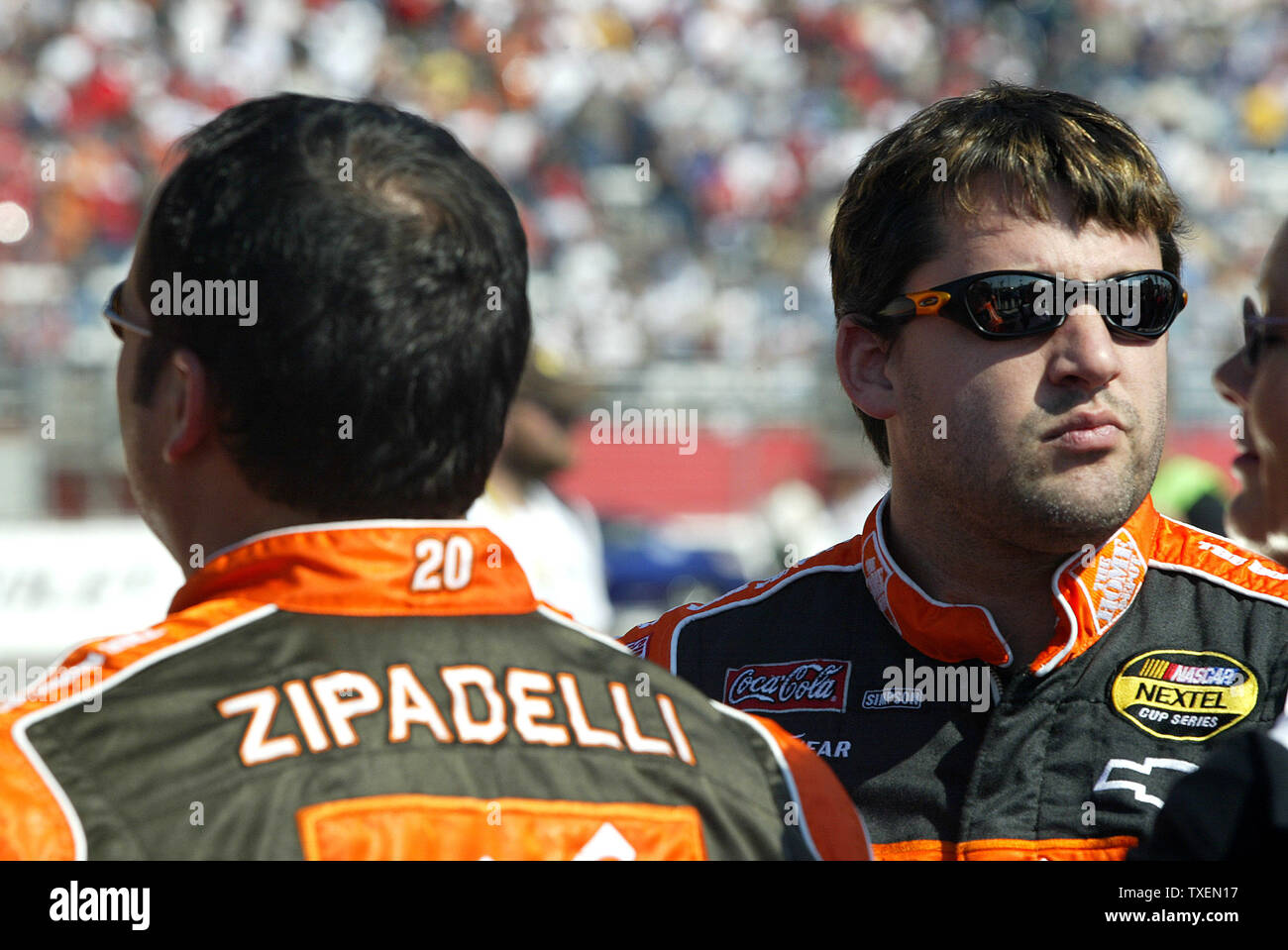 Race car driver Tony Stewart, right, stands with crew chief Greg ...