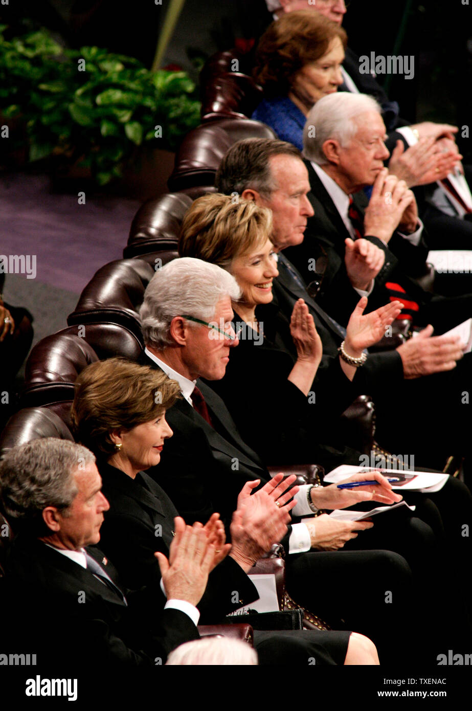From bottom to top, U.S. President George Bush, First Lady Laura Bush ...