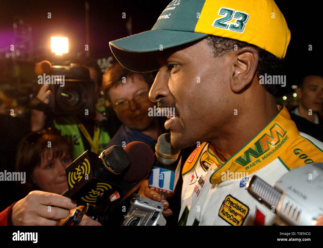 Bill Lester talks with the press after he qualified his Nextel Cup ...