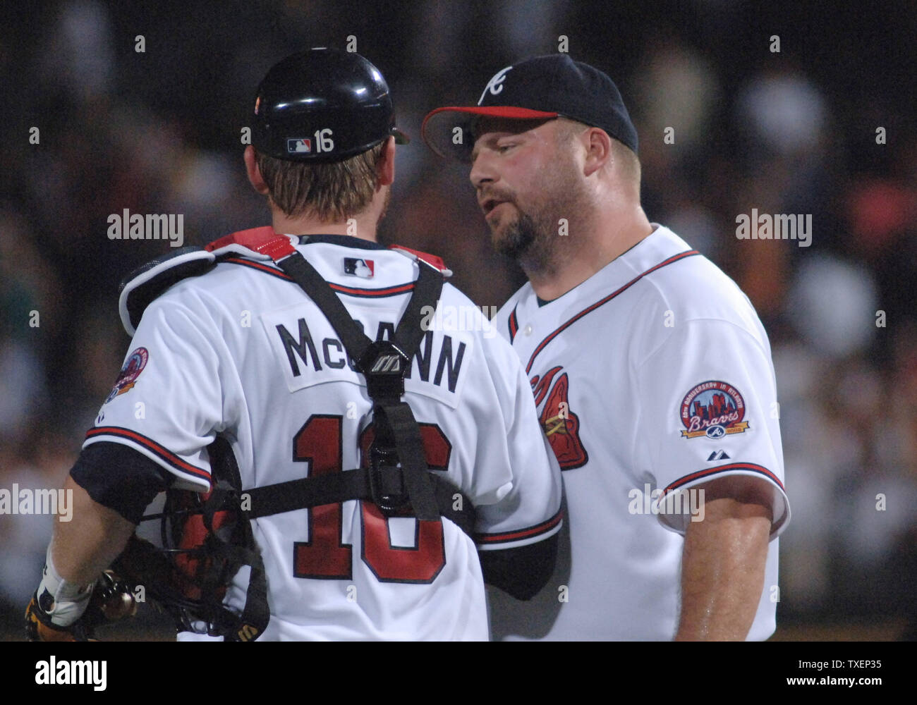 Atlanta Braves closing pitcher Bob Wickman and catcher Brian McCann ...