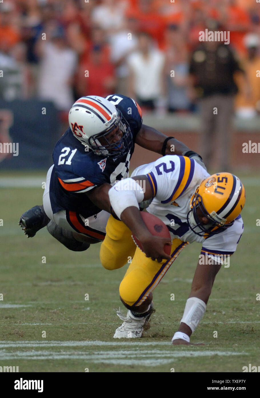 LSU quarterback JaMarcus Russell (2) is brought down by Auburn ...