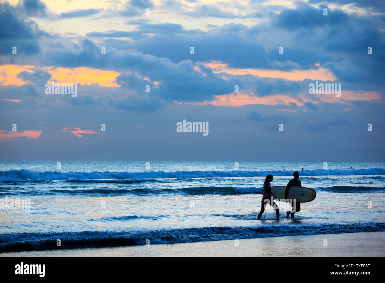 Kuta Beach Sunset Stock Photo - Alamy