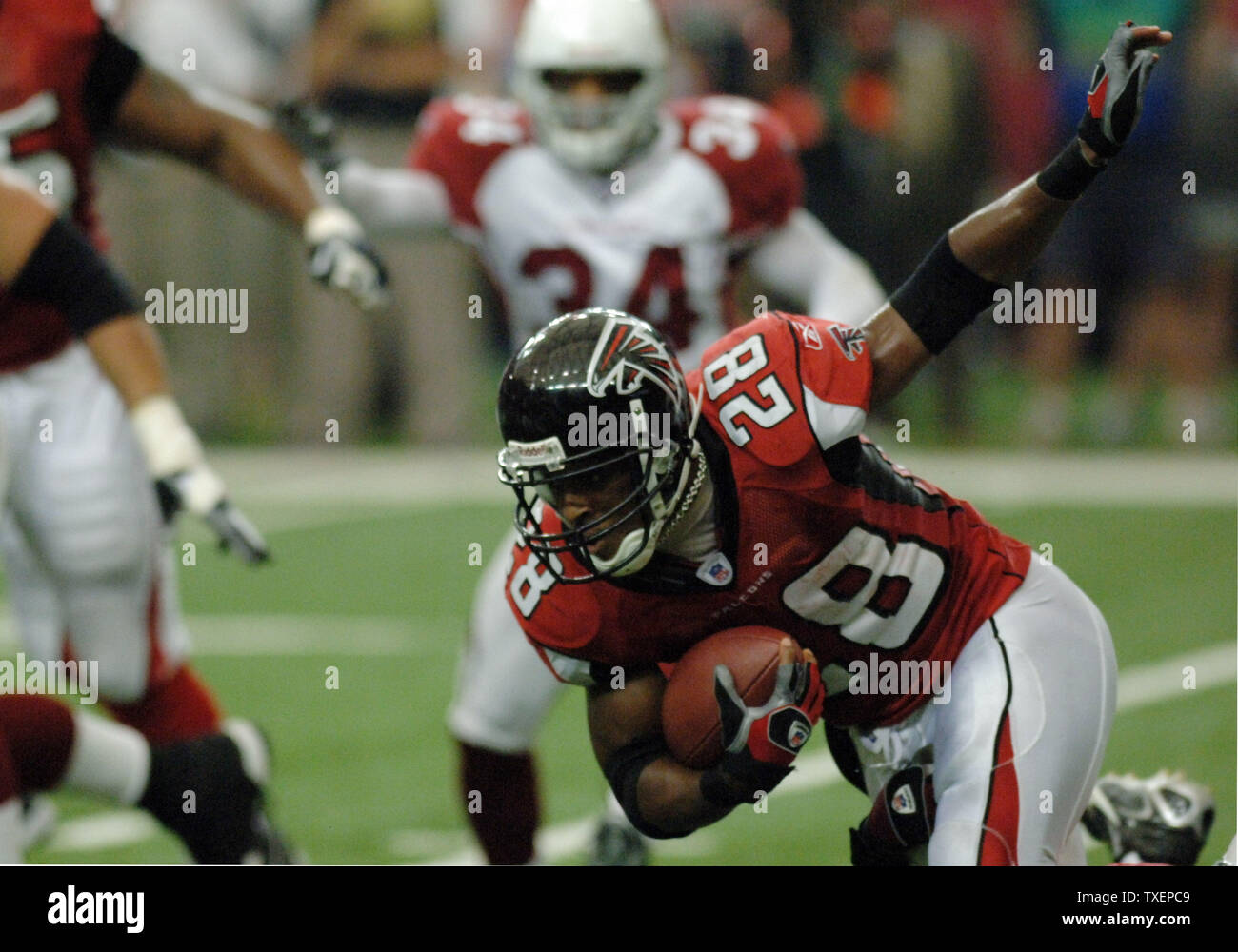 Atlanta Falcons running back Warrick Dunn (28) runs for a first down ...