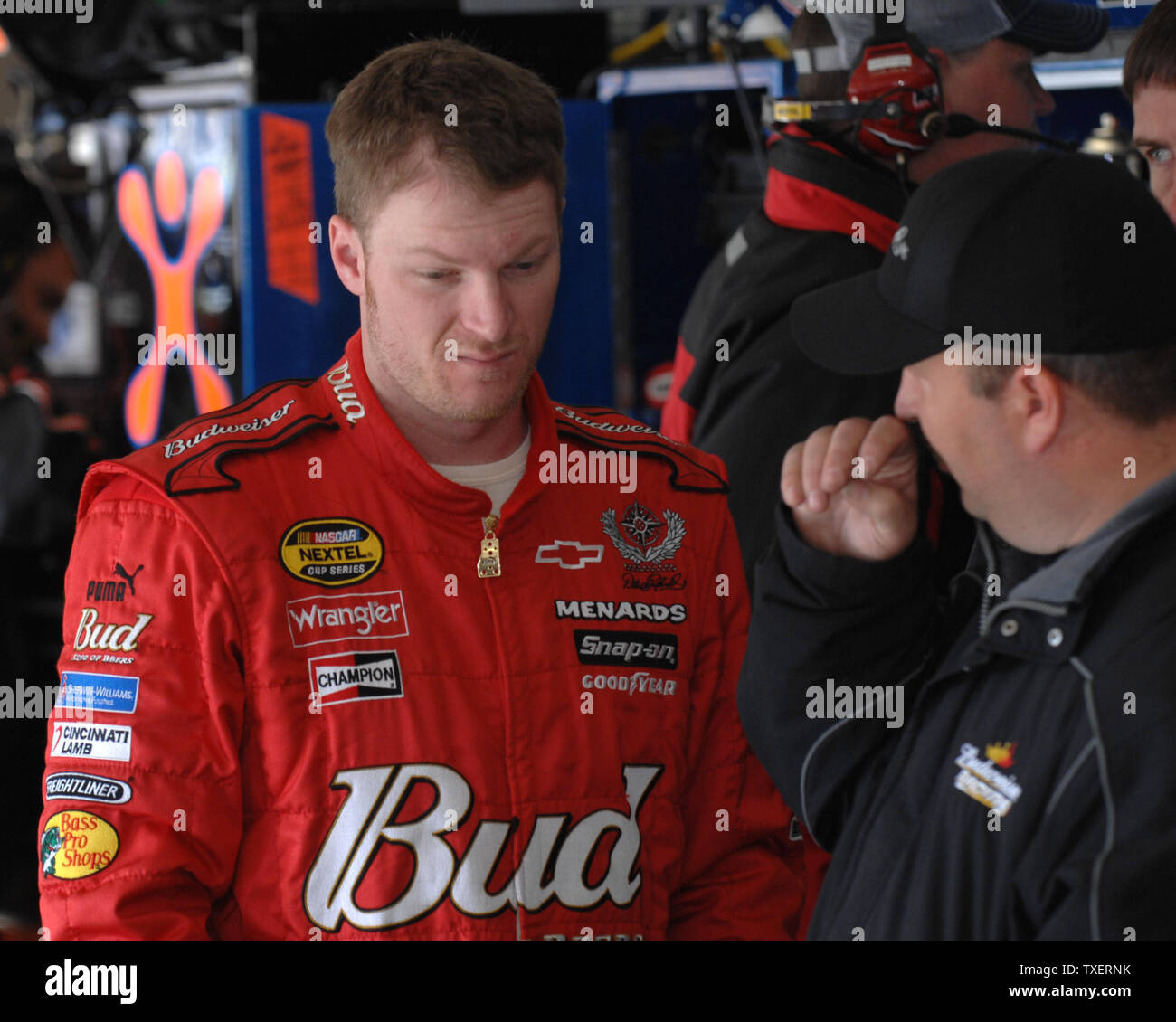 Dale Earnhardt, Jr., (left) talks with his Budweiser Chevrolet crew ...