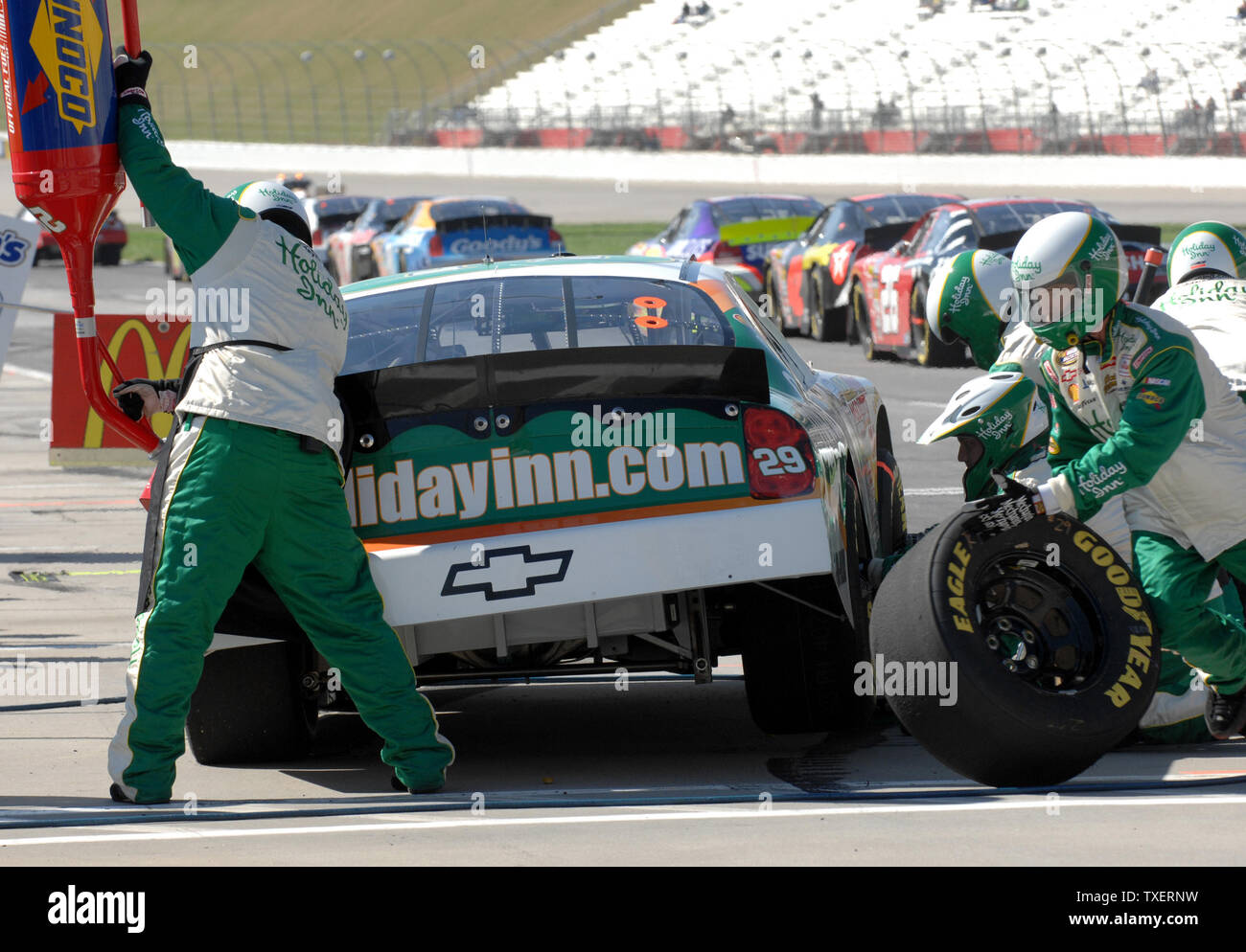 Jeff Burton (29), in the Holiday Inn Chevrolet is serviced in the pits ...