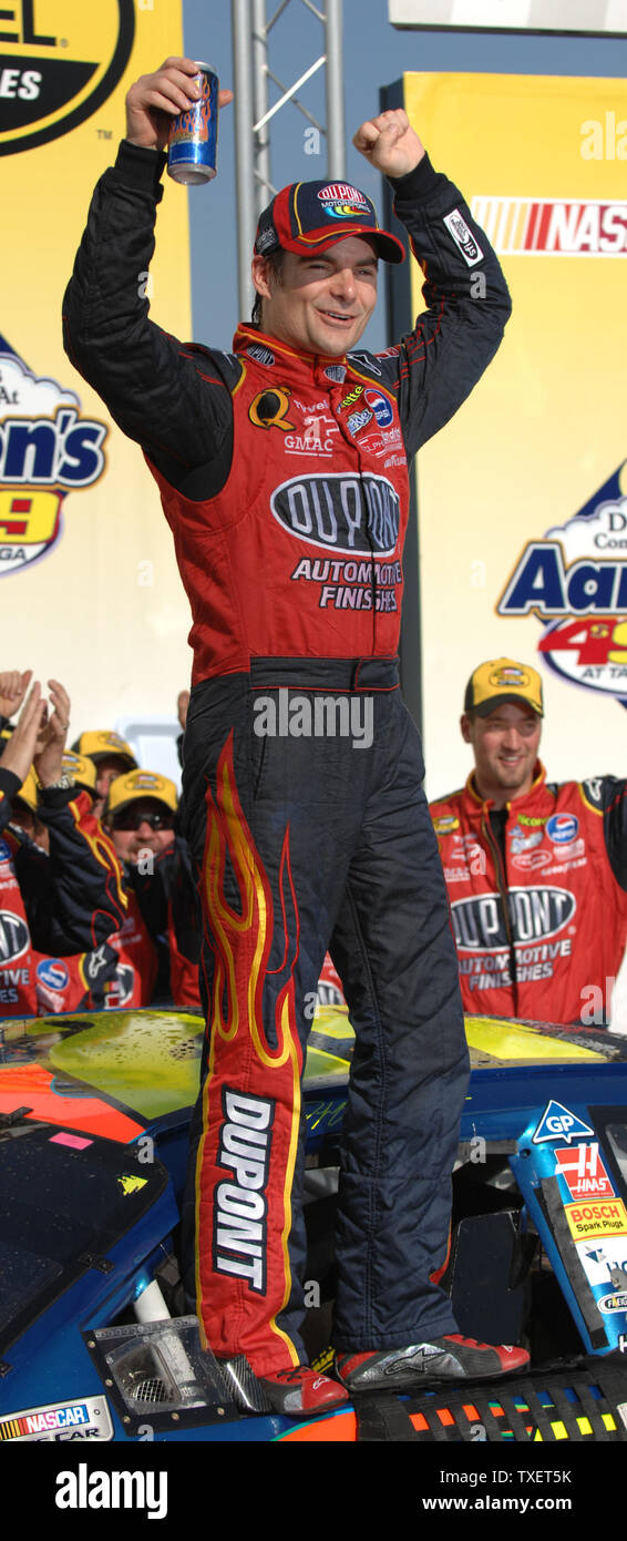 Race winner Jeff Gordon, who started from the pole, celebrates in ...