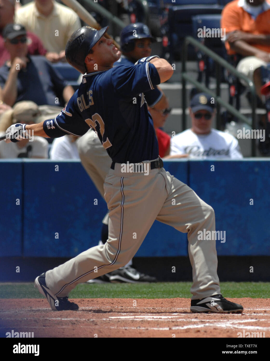 San Diego Padres Marcus Giles hits a single against the Atlanta Braves ...