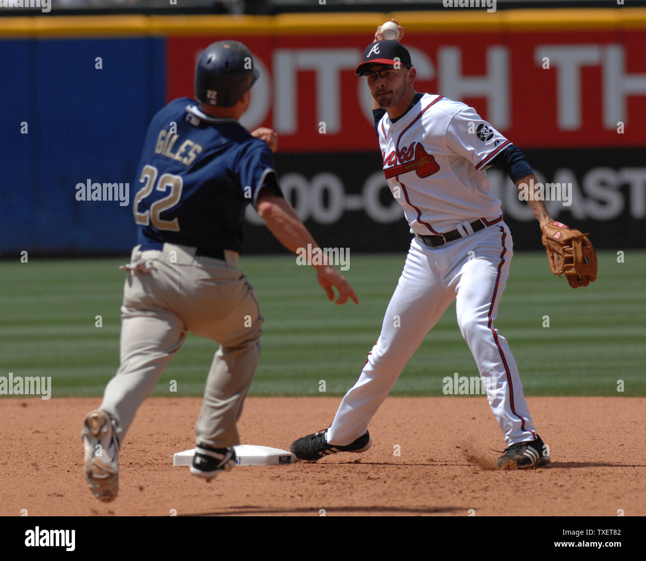 San Diego Padres base runner Marcus Giles charges to second on a force ...