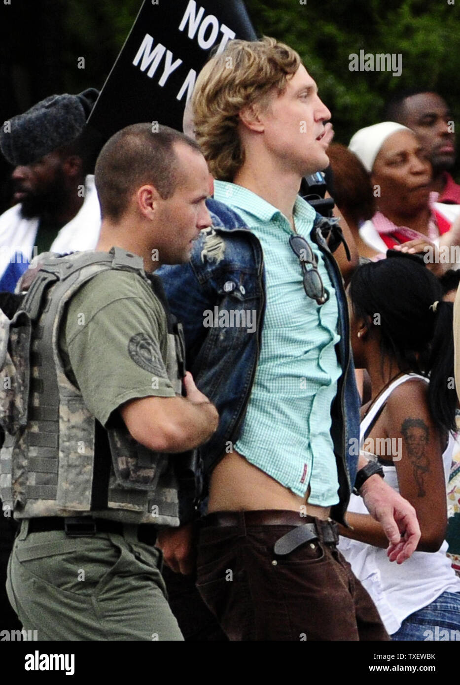A protester is arrested at the scene outside the Georgia Diagnostic and ...