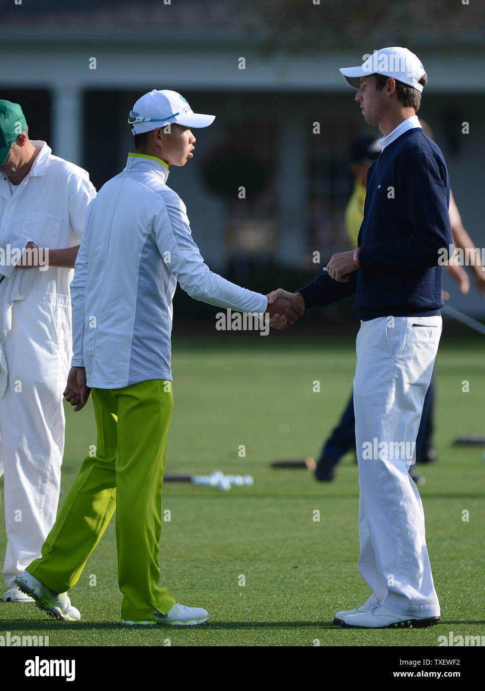 Asia-Pacific Amateur Champion Guan Tianlang (L) of China, greets U.S ...