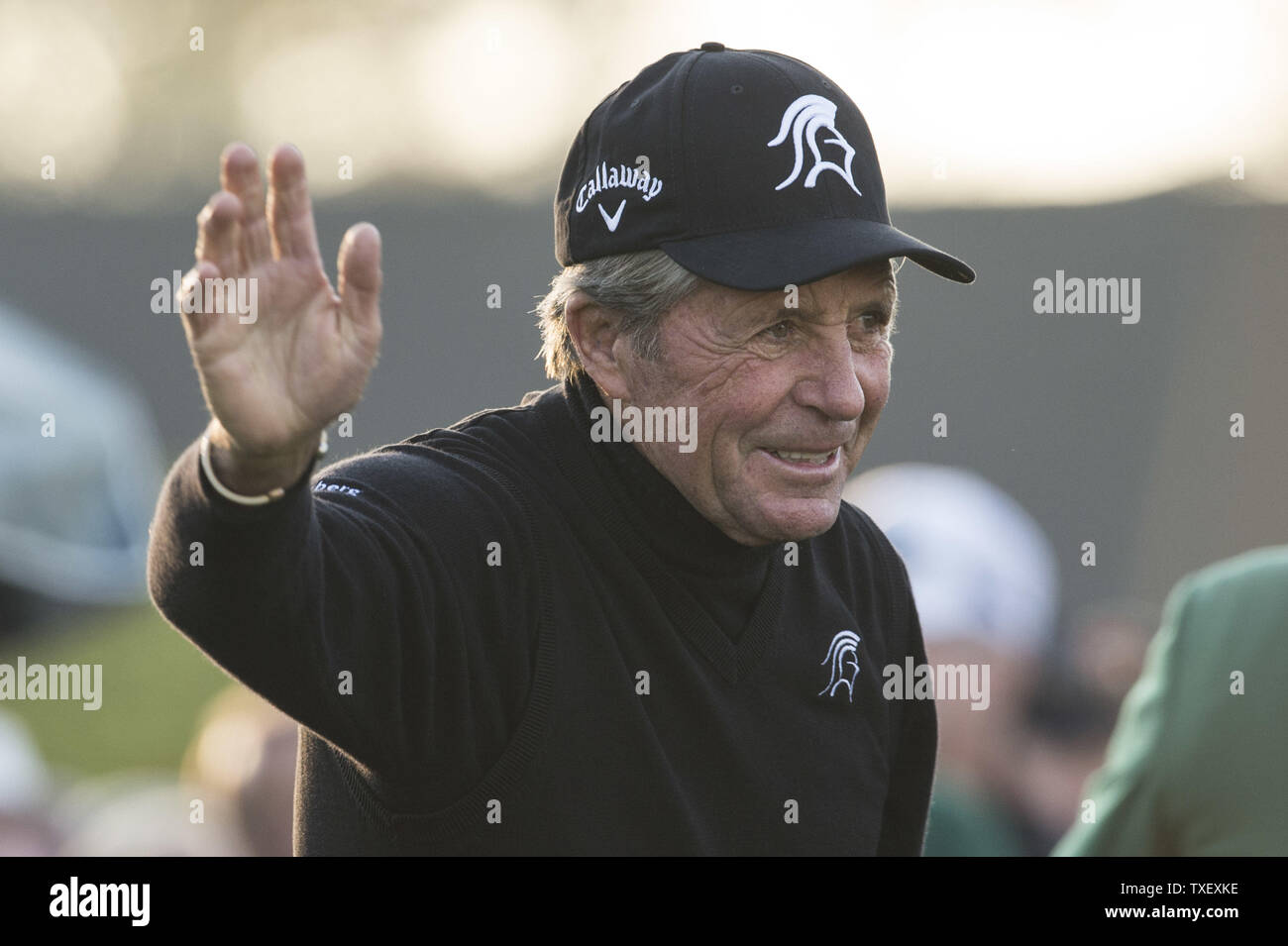 Honorary starter Gary Player waves to the patrons after hitting the ...