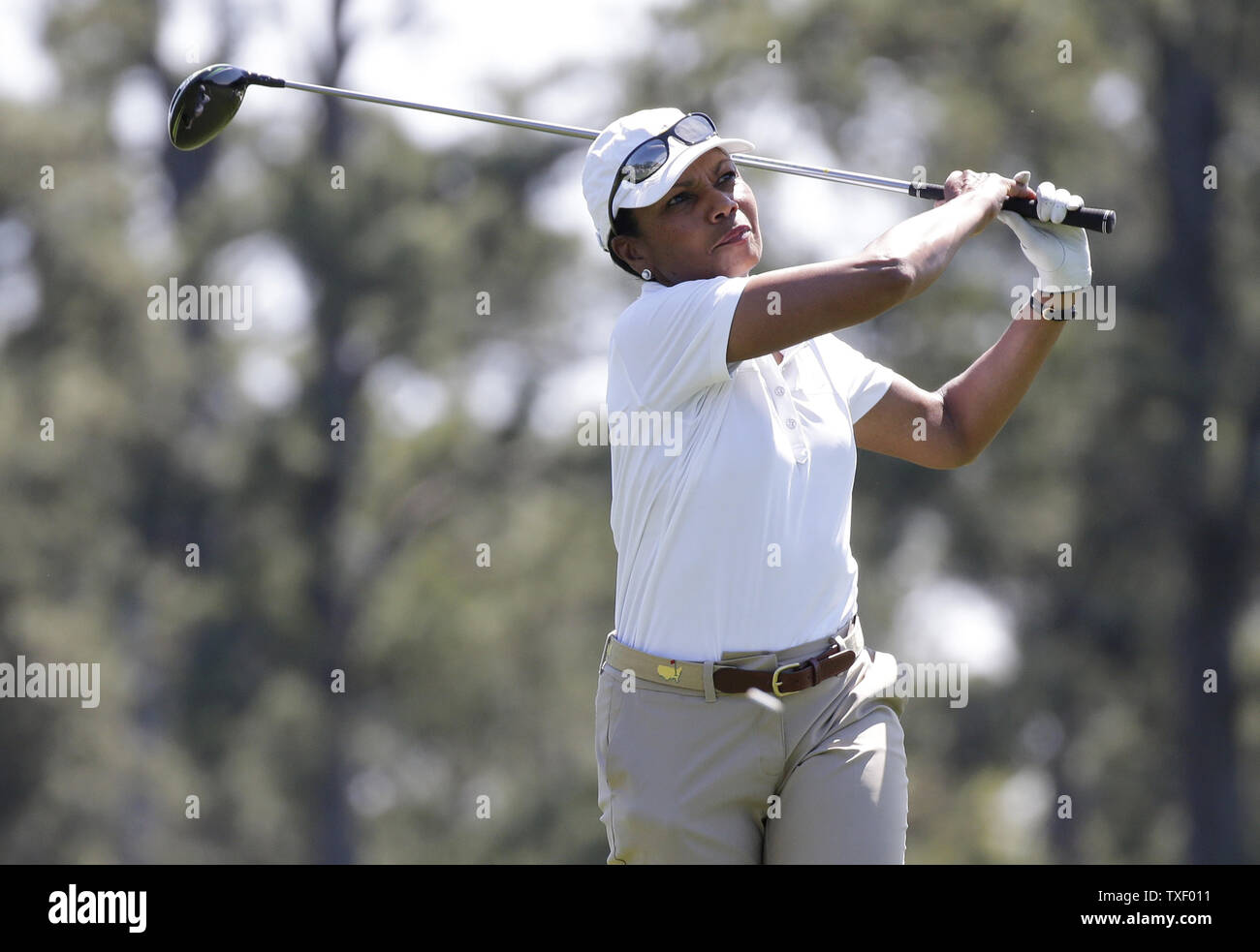 Former United States Secretary of State Condoleezza Rice hits a tee ...
