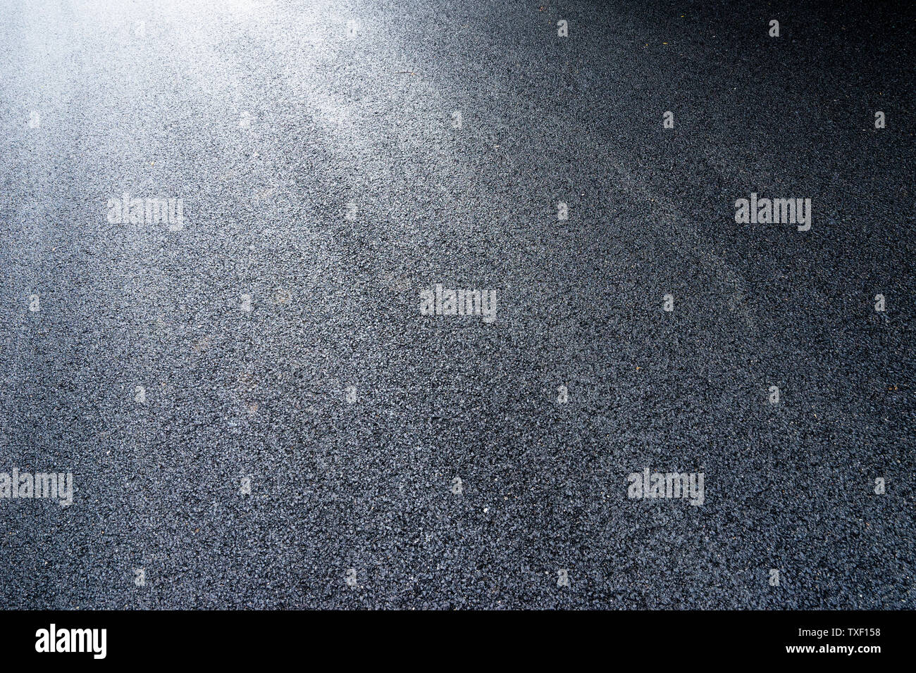asphalt road under light Stock Photo - Alamy