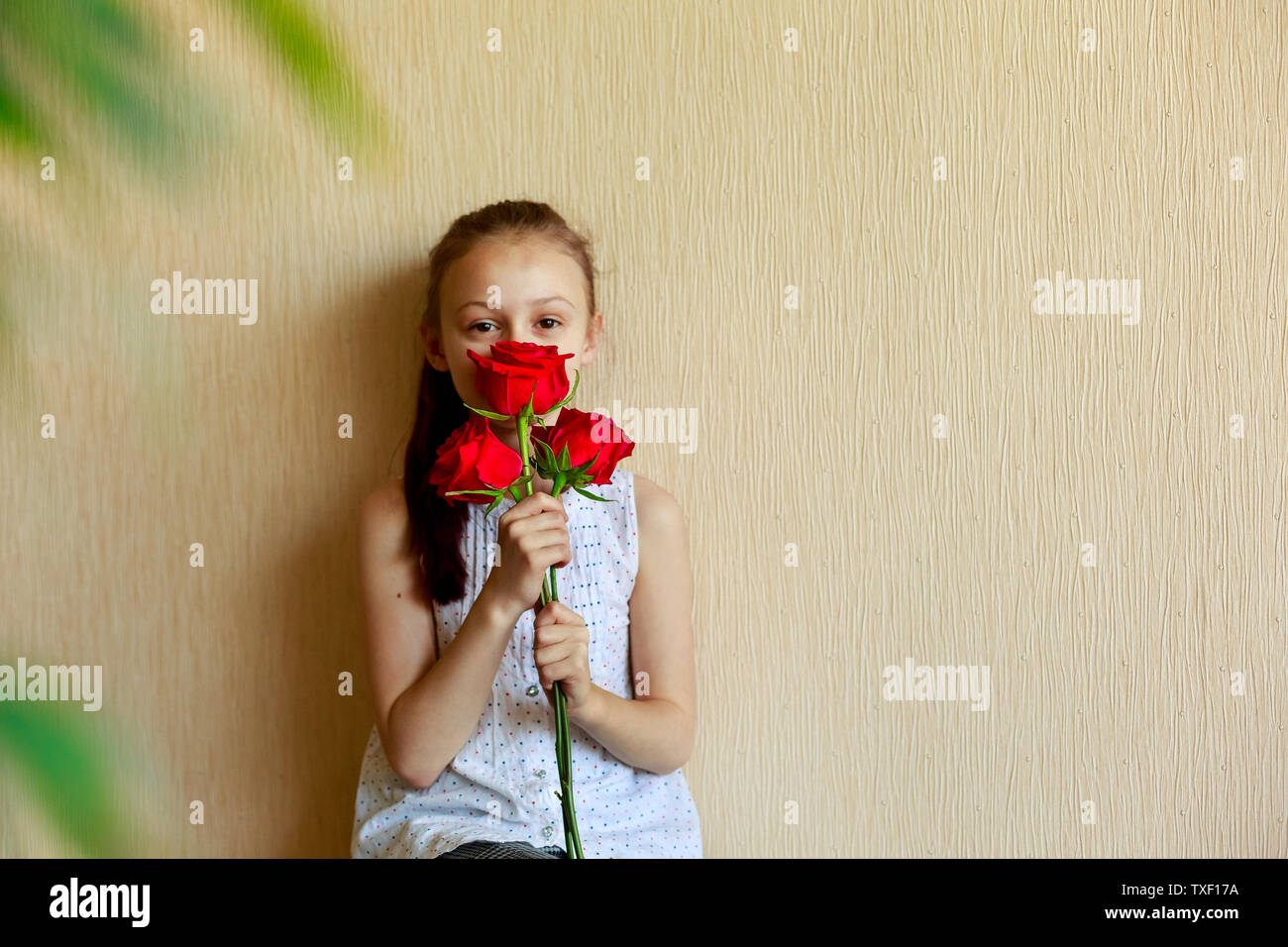 Adorable child holding rose hi-res stock photography and images - Alamy