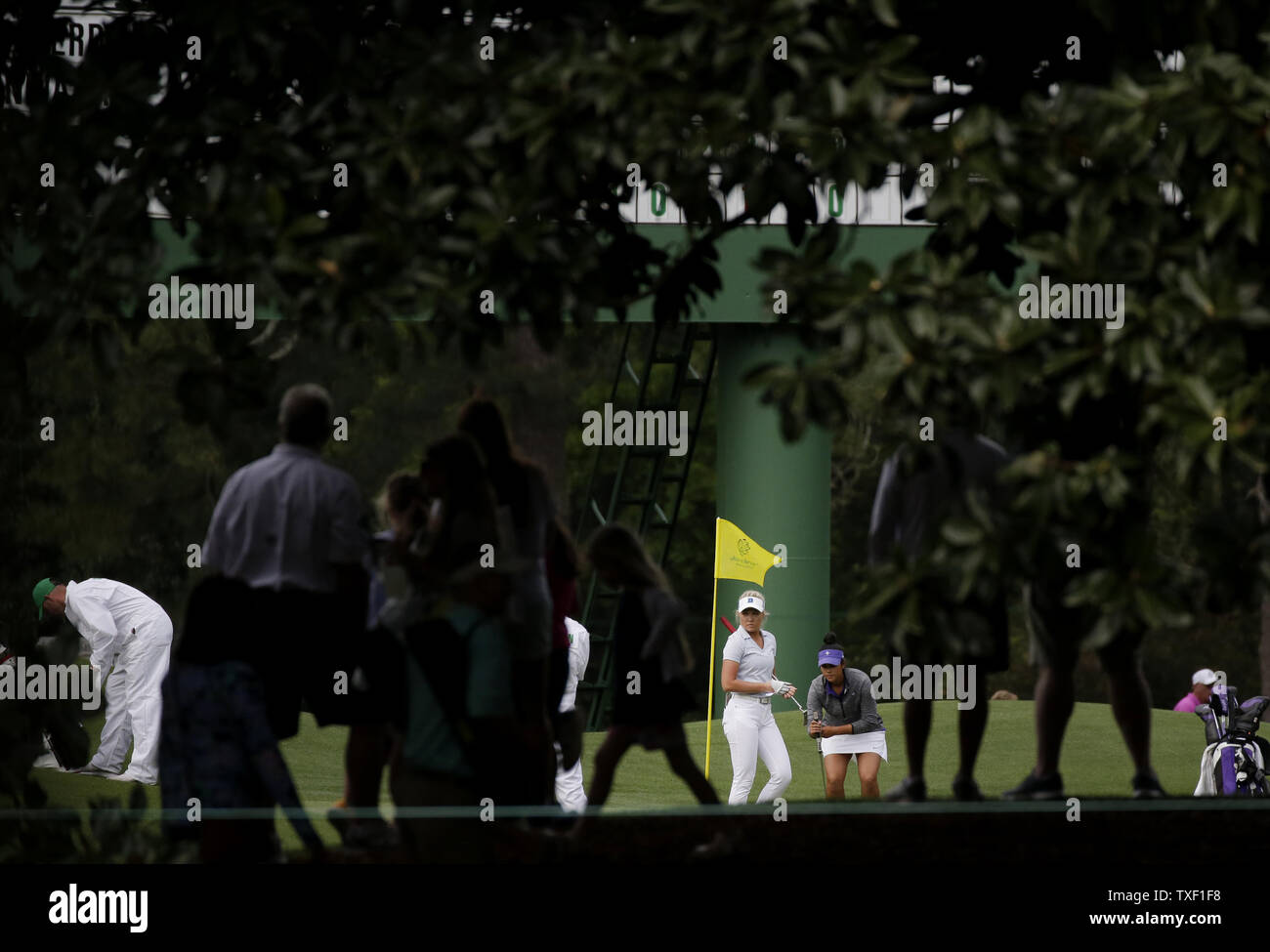 Erica Shepherd and Natalie Srinivasan line up putts on the 8th green in ...