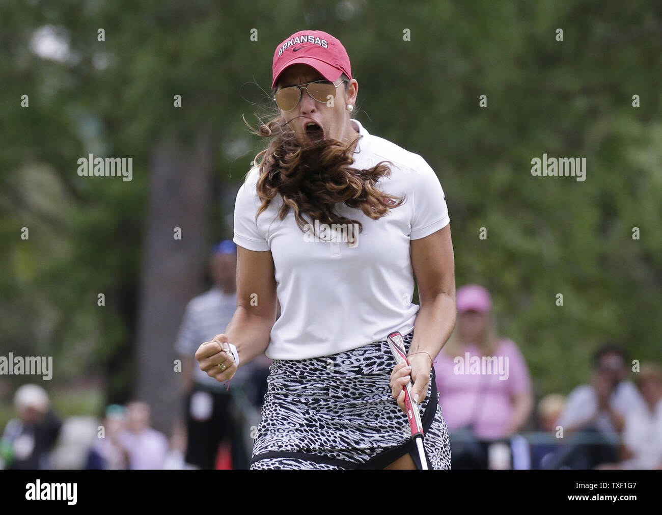 Maria Fassi of Mexico reacts after making a birdie putt in the final ...