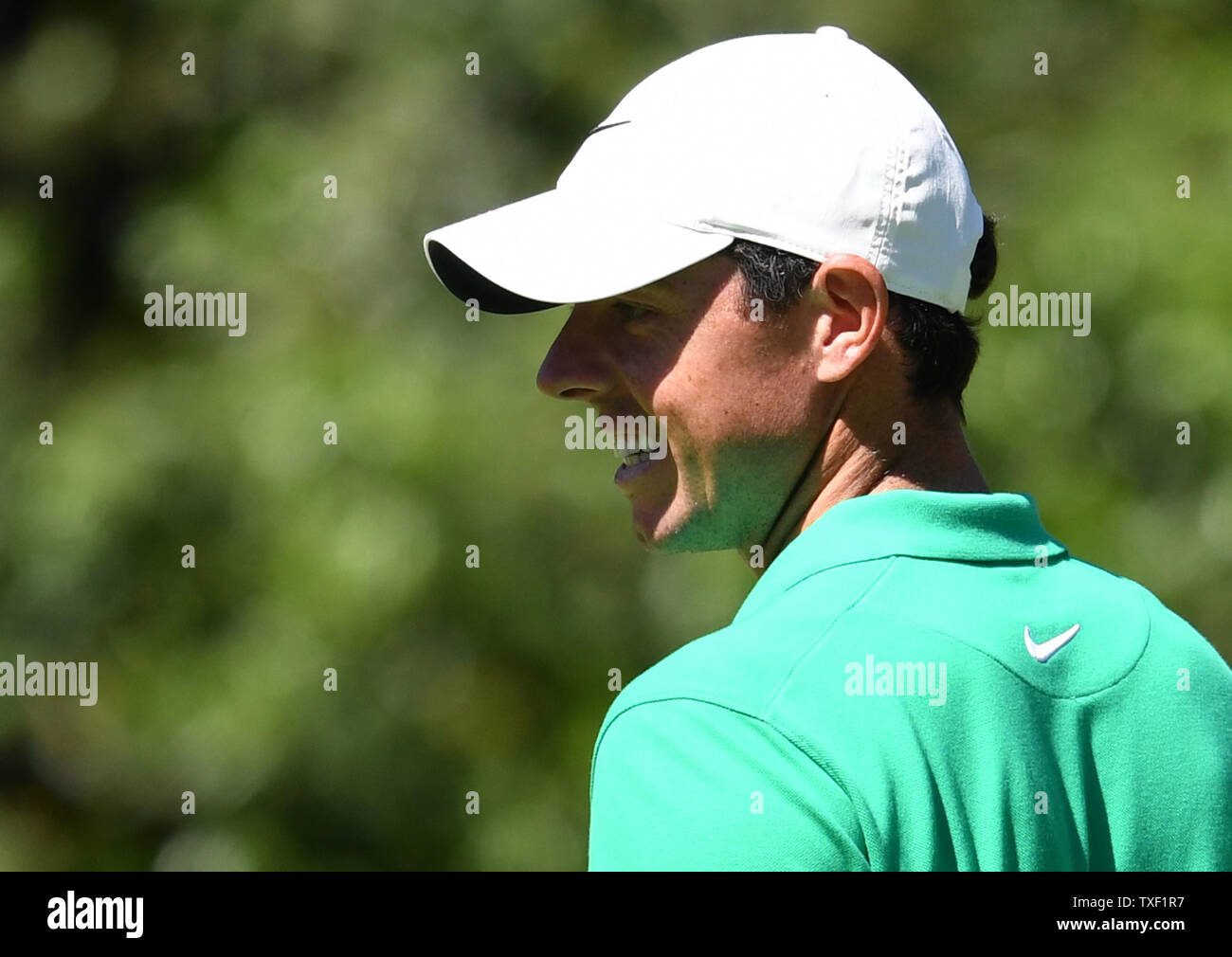 Rory McIlroy of Northern Ireland smiles while at practice on the ...