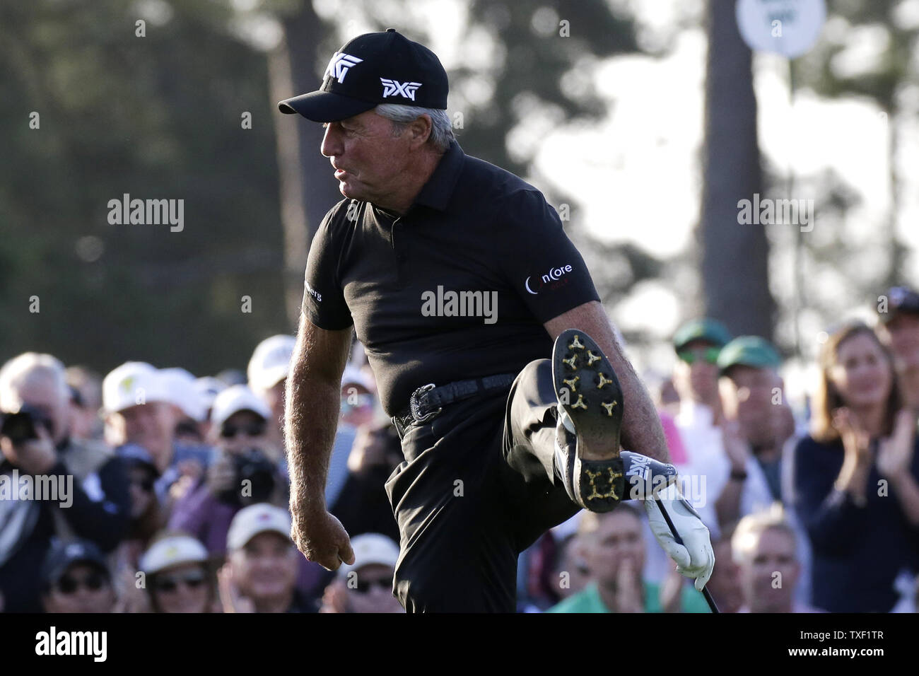 Gary Player does a leg kick after his tee shot on the first tee when he ...
