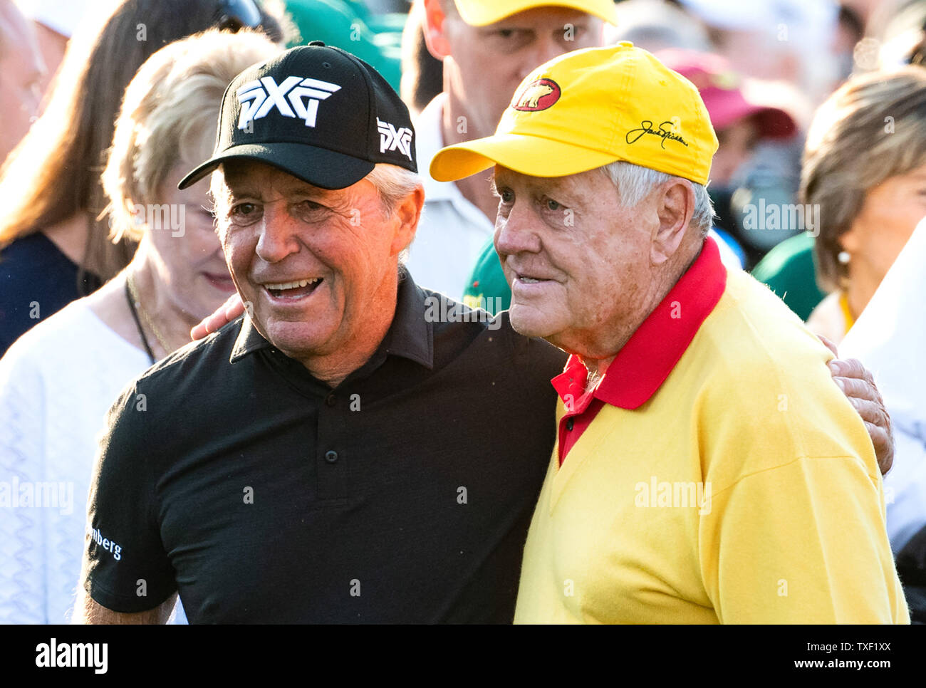 Golf legends Gary Player (L) and Jack Nicklaus embrace as they arrive ...