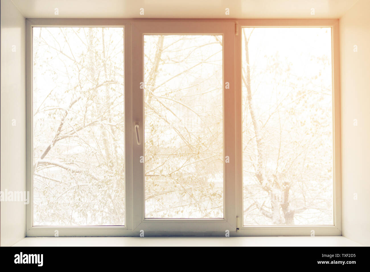 Modern residential window in winter. sunlight Stock Photo - Alamy