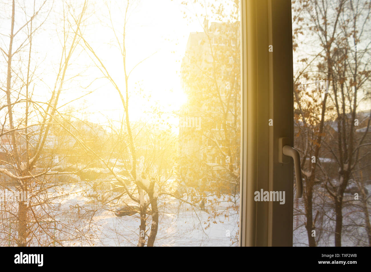 Modern residential window in winter. sunlight Stock Photo - Alamy