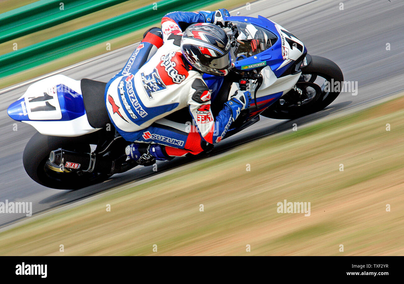 Ben Spies dives into the fifth turn during the running of the AMA ...