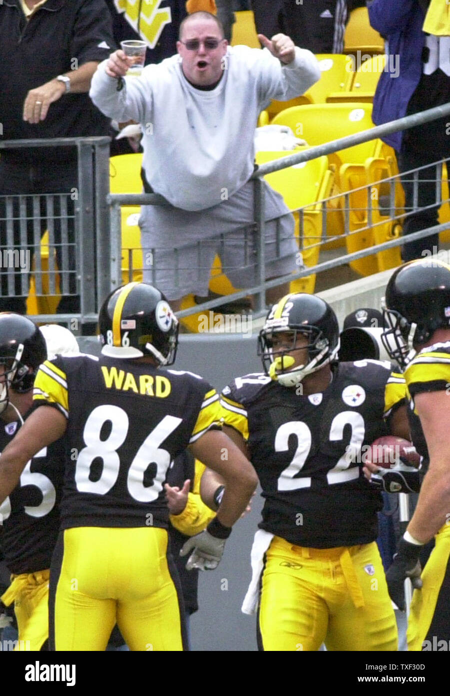 A Pittsburgh Steelers fan and Hines Ward celebrates Duce Staley's ...