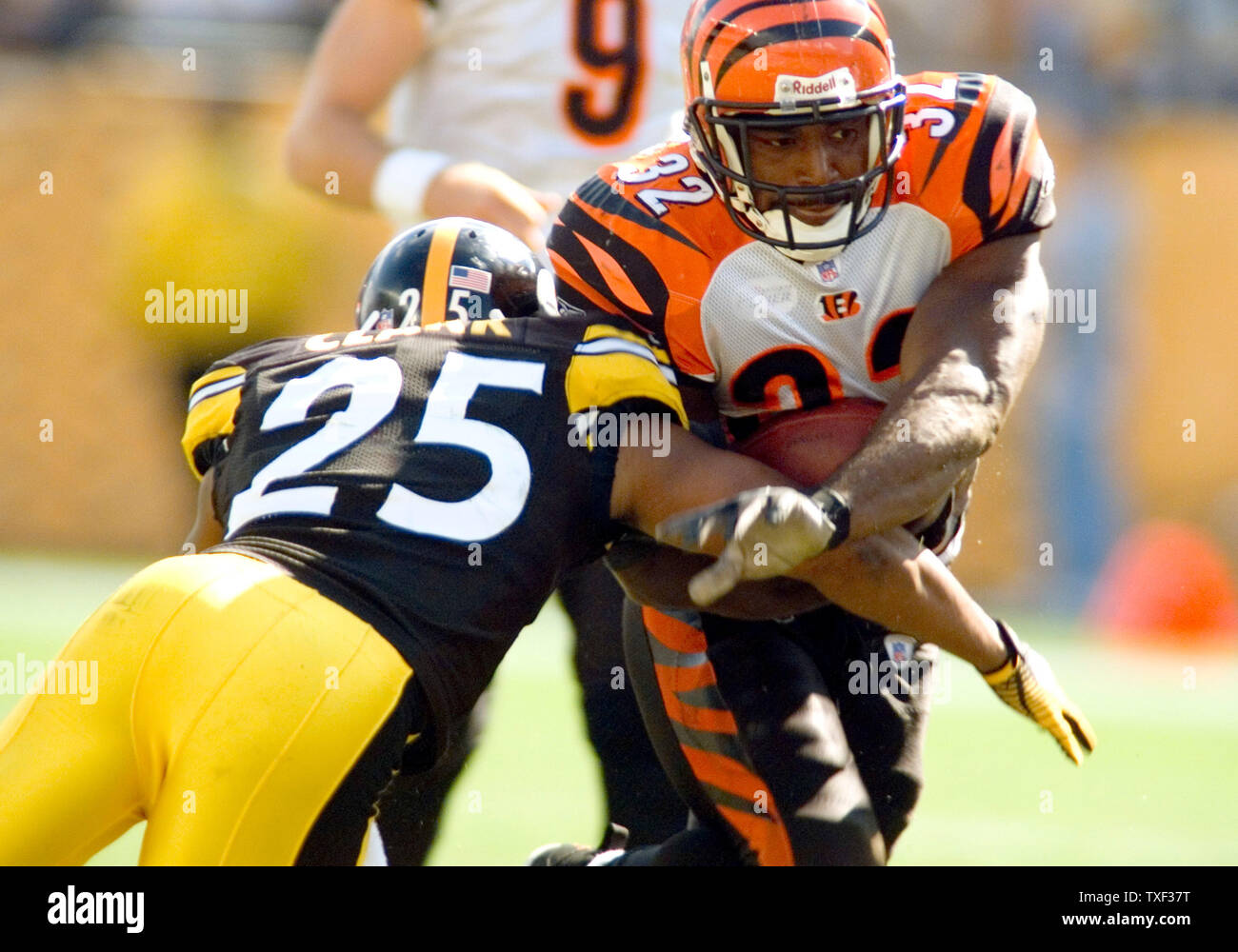 Cincinnati Bengals Rudi Johnson is brought down by Pittsburgh Steelers ...