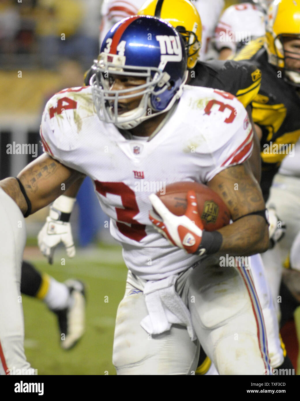 New York Giants Derrick Ward gains seven yards to the two yard line ...