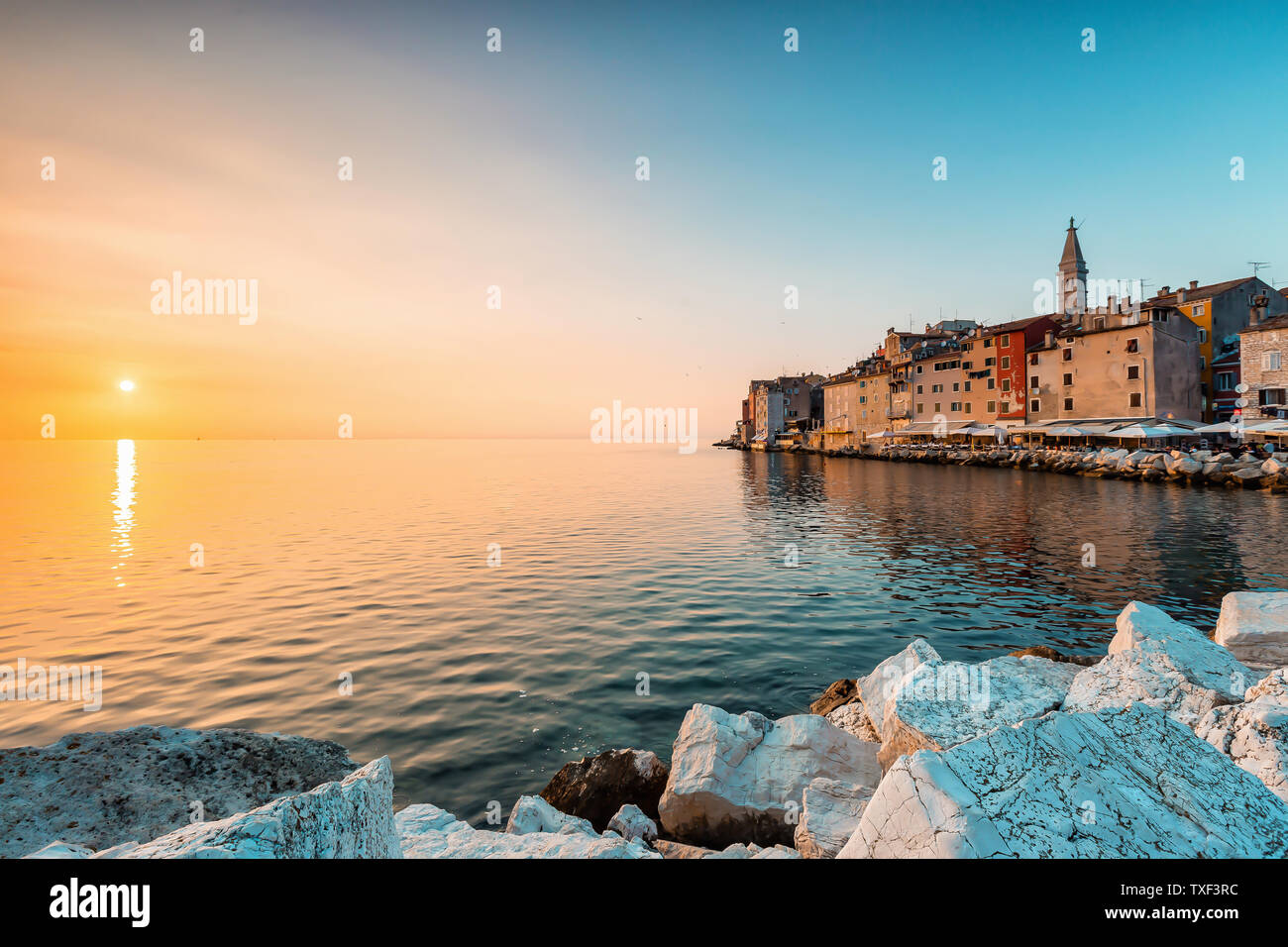 The sunset at the port Stock Photo - Alamy