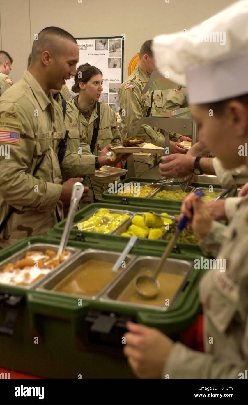 U. S. soldiers of the 3rd Brigade of 1st Armored Division celebrate ...