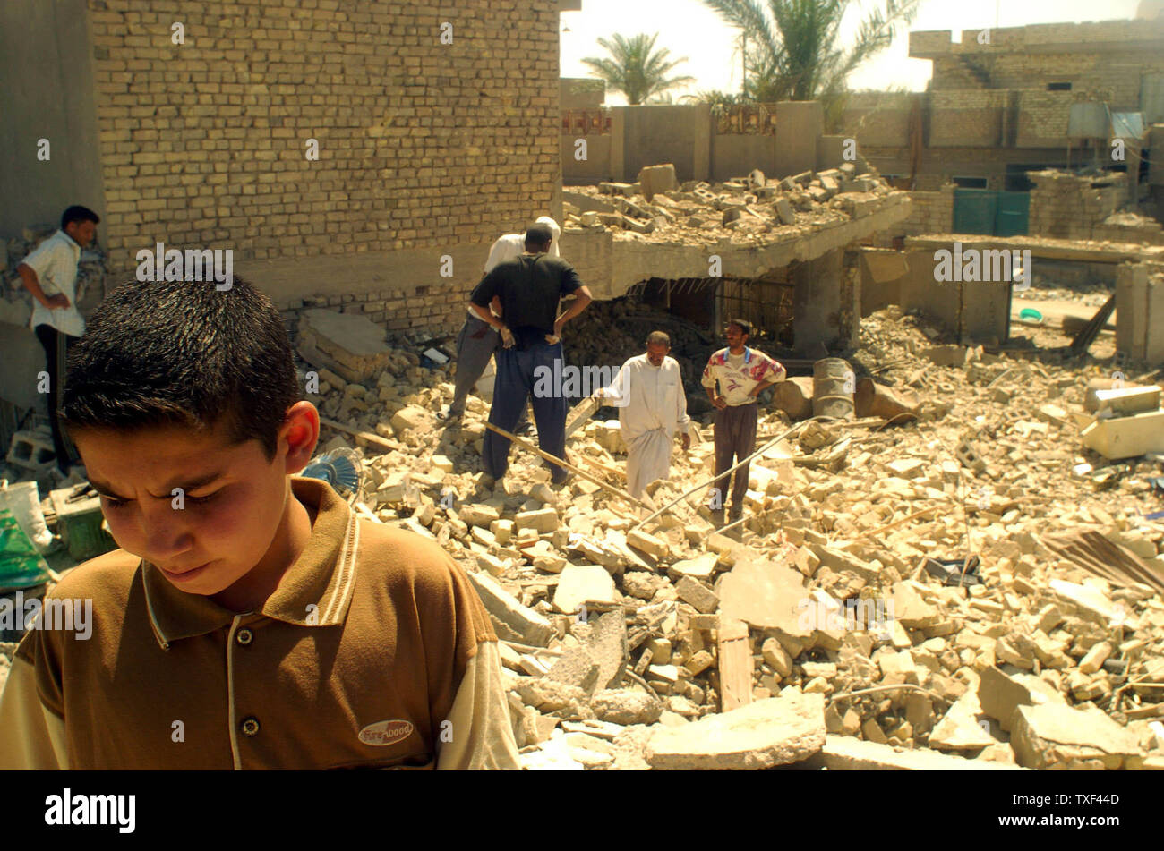 The rubble of some houses in Fallujah is apparent as Iraqis try to get ...