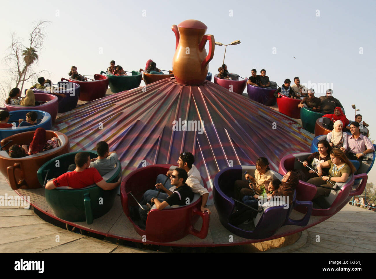 Iraqi Sunni Muslims visit Zawra park as they celebrate the first day of ...