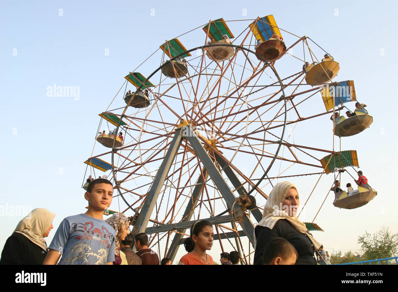 Iraqi Sunni Muslims visit Zawra park as they celebrate the first day of ...